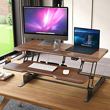 Motorized standing desk converter store